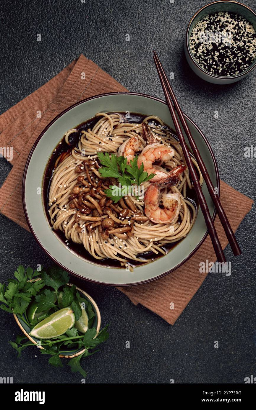 Soba, buckwheat noodles, with shimeji mushrooms and tiger shrimps ...