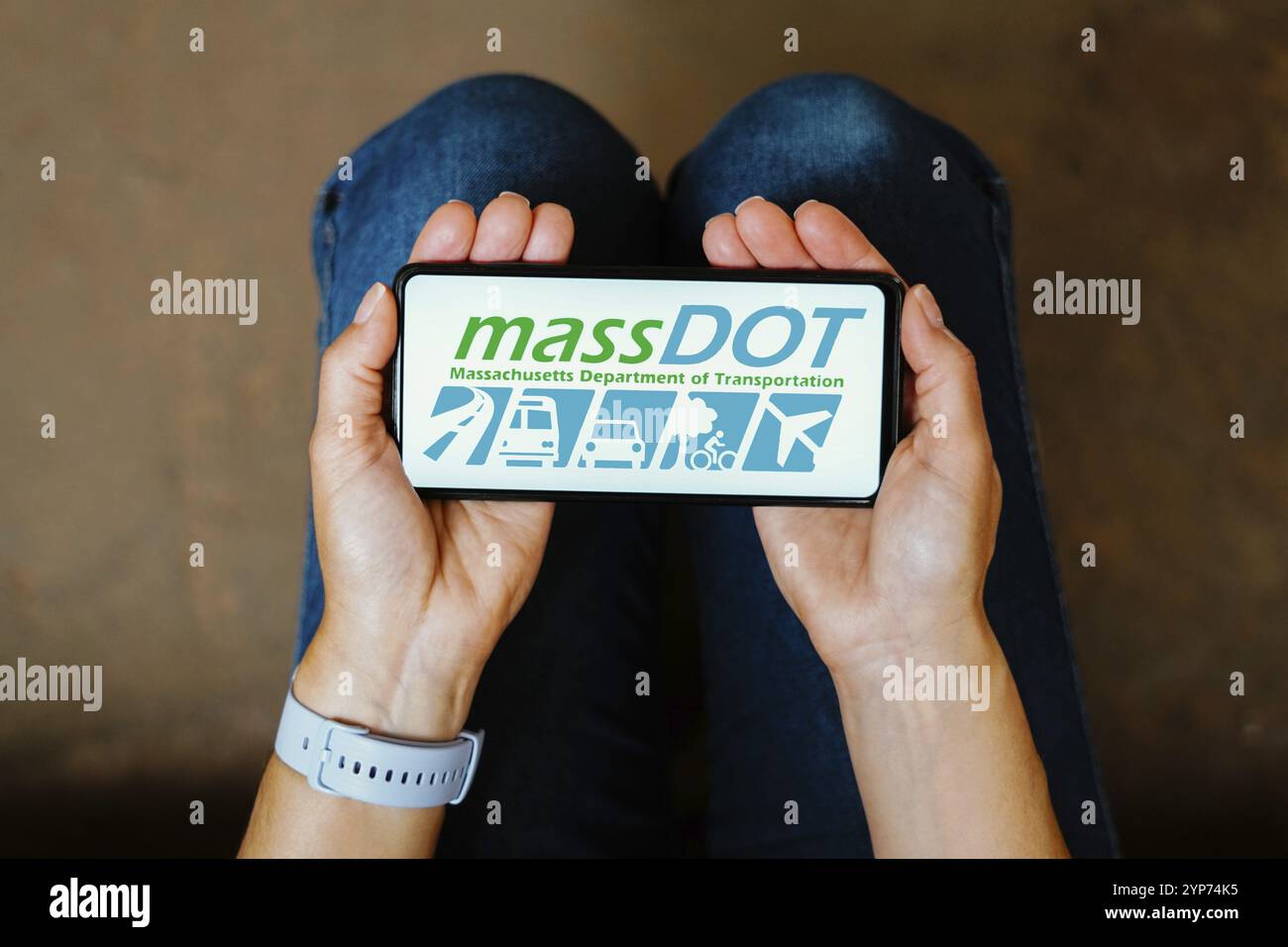 In this photo illustration, the Massachusetts Department of ...