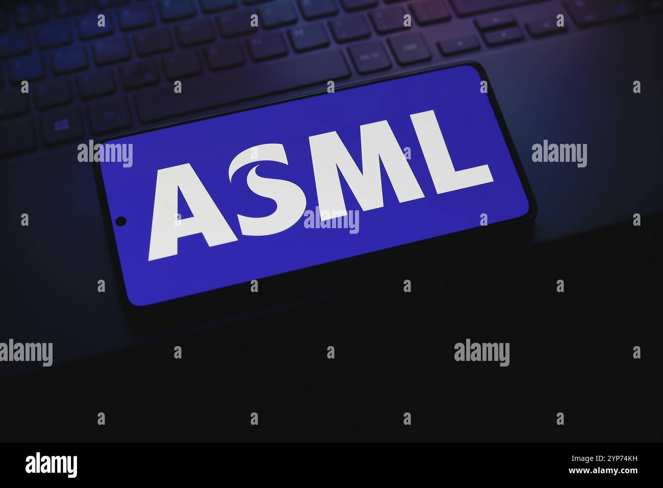 In this photo illustration, the ASML Holding logo is displayed on a ...