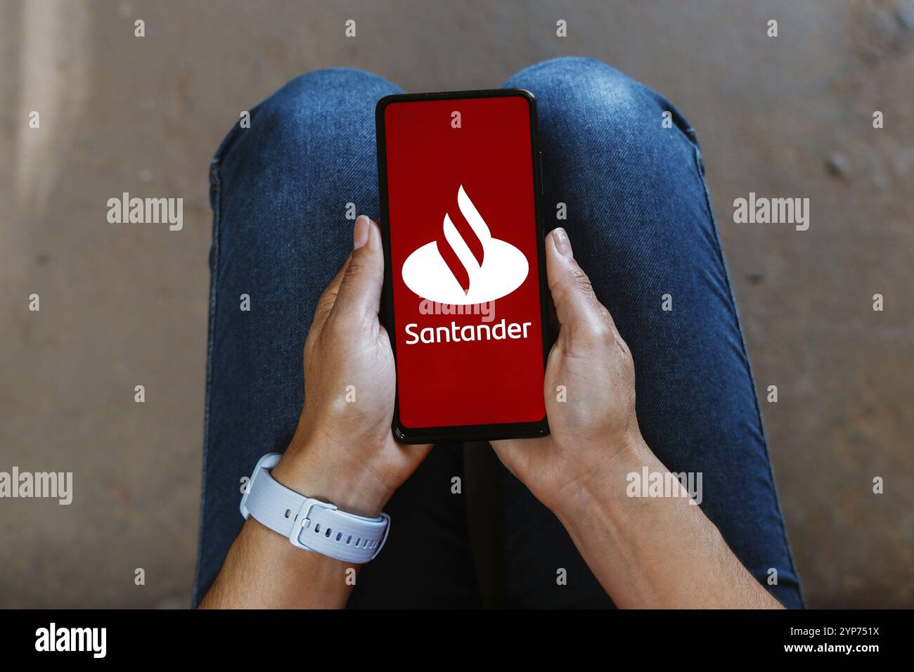 In this photo illustration, the Santander logo is displayed on a ...