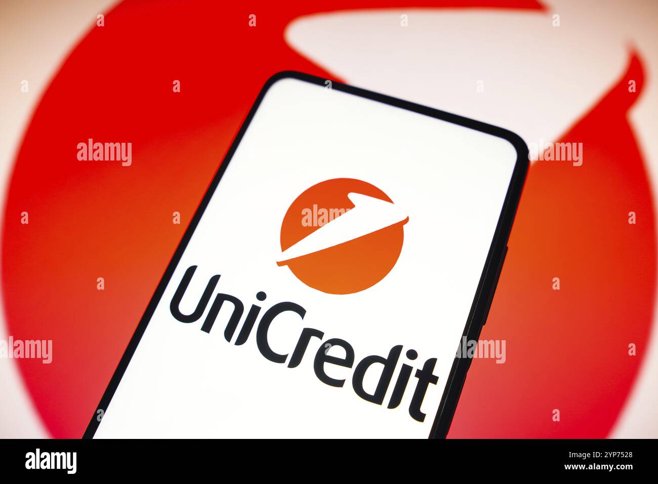 In this photo illustration, the UniCredit logo is seen displayed on a ...