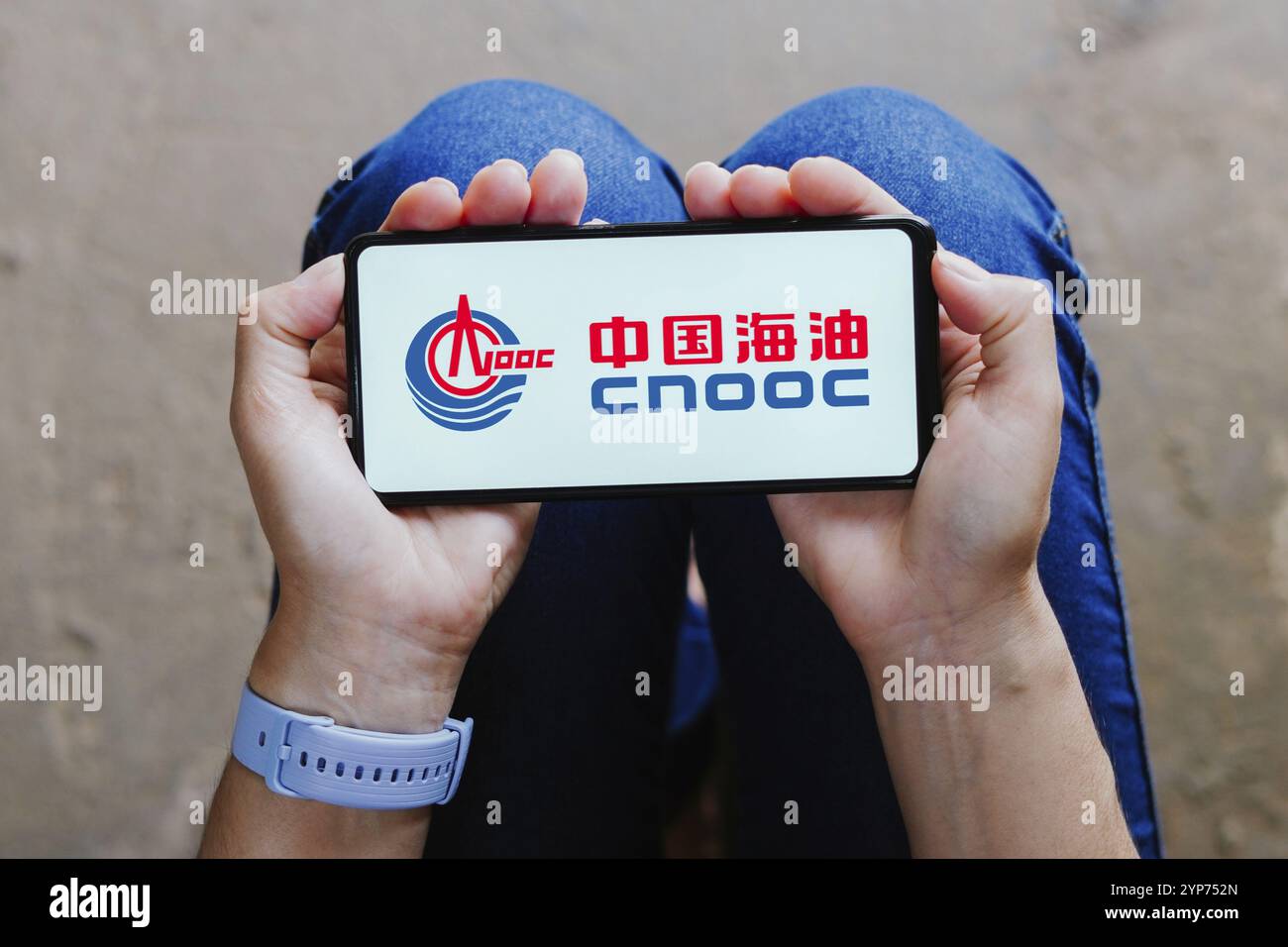 In this photo illustration, the China National Offshore Oil Corporation ...