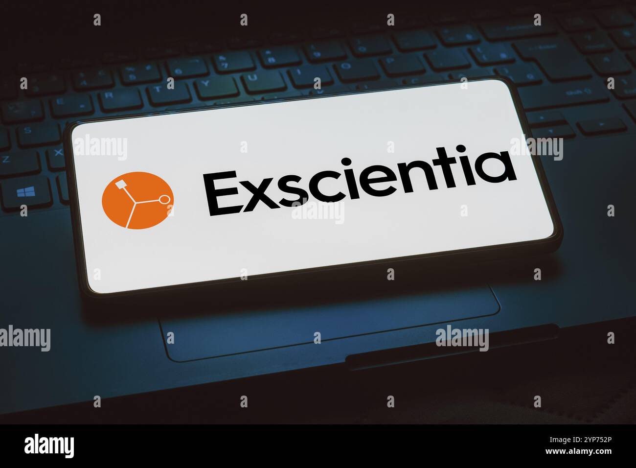 In this photo illustration, the Exscientia AI logo is displayed on a smartphone screen Stock ...