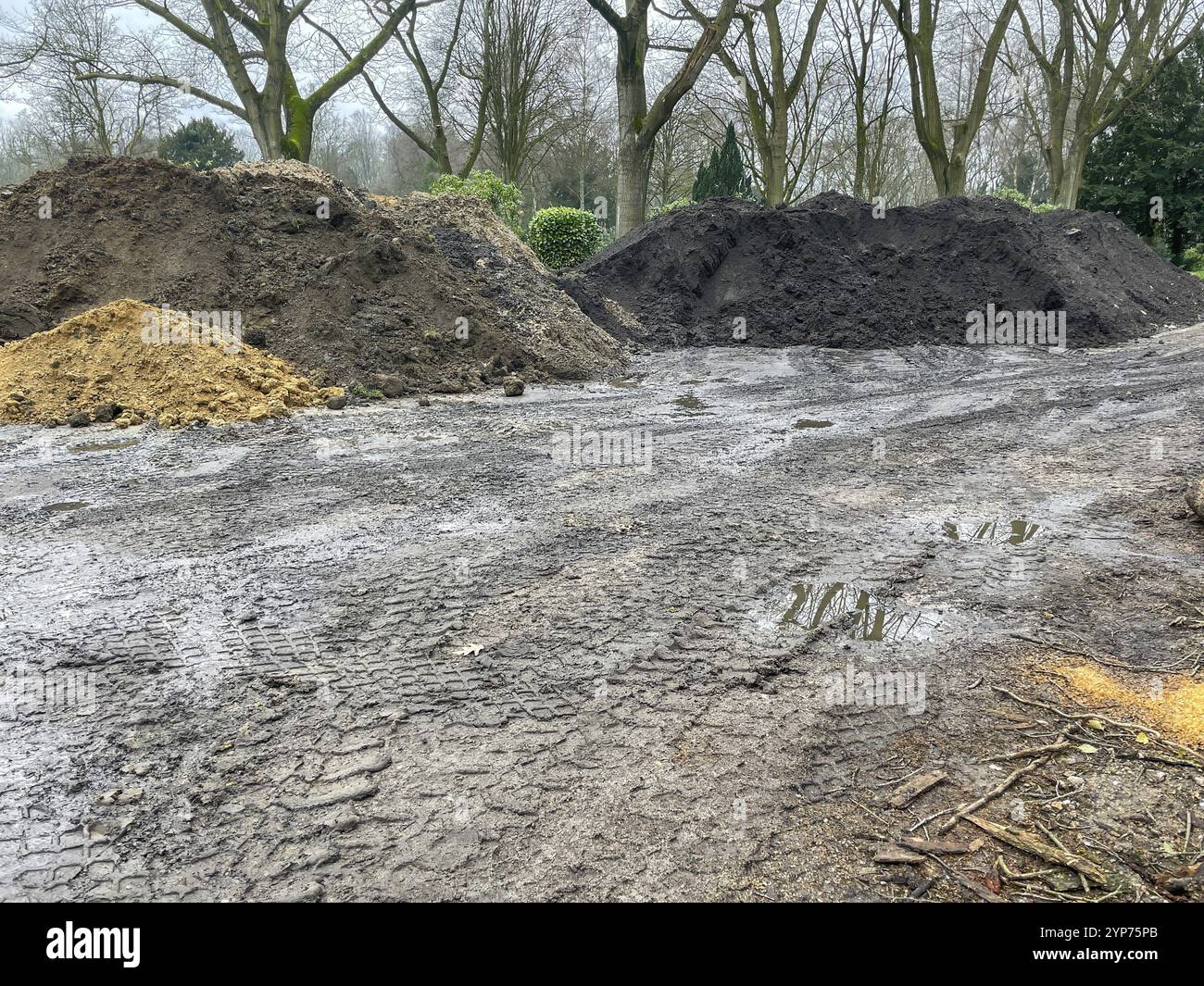 Storage area with various piles of earth Stock Photo - Alamy