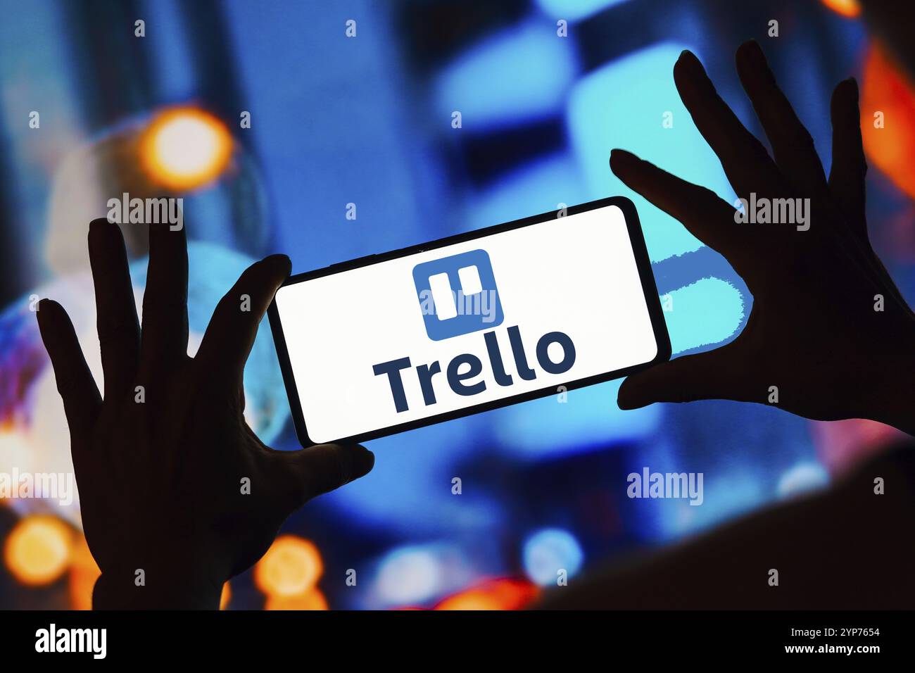 In this photo illustration, the Trello logo seen displayed on a ...