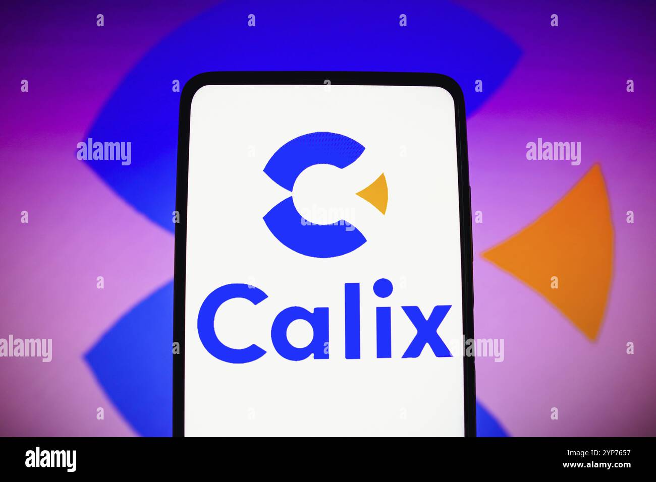 In this photo illustration, the Calix logo is displayed on a smartphone ...
