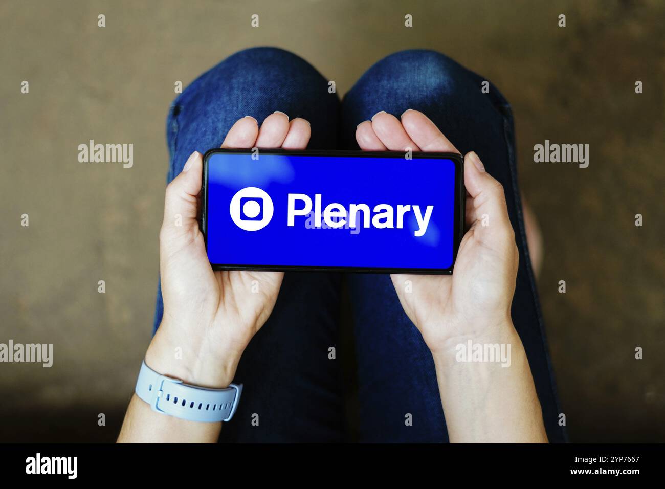 In this photo illustration, the Plenary Group logo seen displayed on a ...