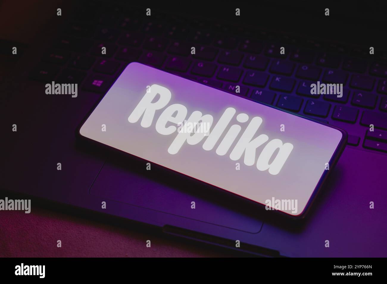 In this photo illustration, the Replika logo is displayed on a ...
