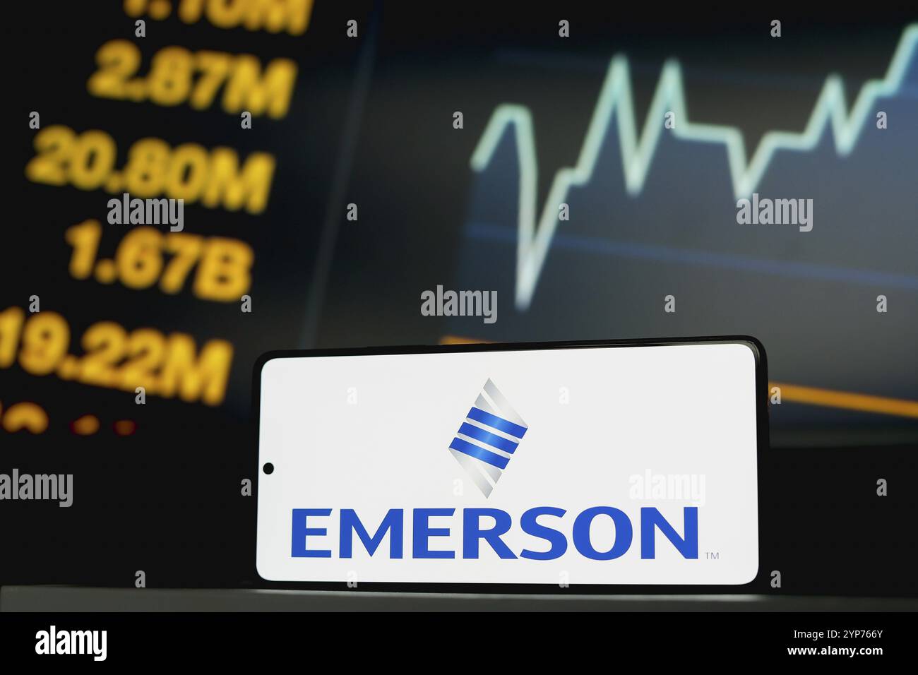 In this photo illustration, the Emerson Electric logo is displayed on a ...