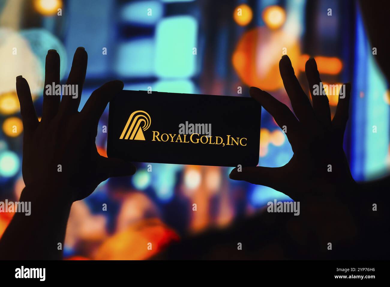 In this photo illustration, the Royal Gold logo is displayed on a ...
