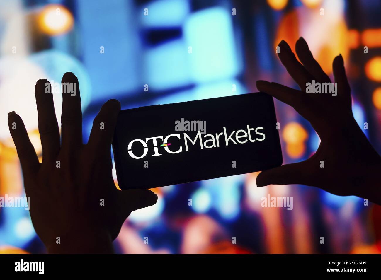 In this photo illustration, the OTC Markets Group logo is displayed on ...