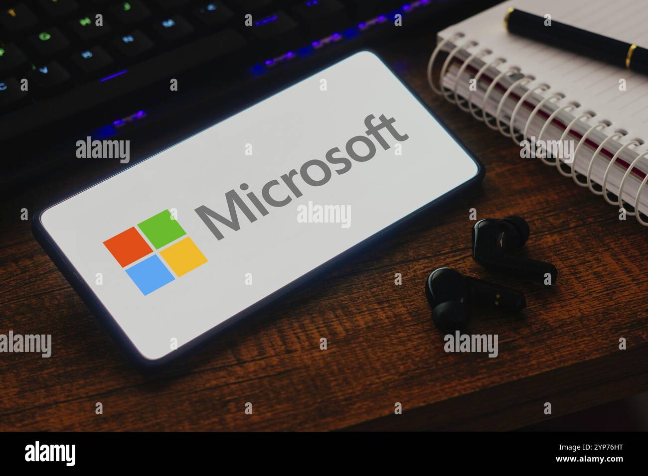 In this photo illustration, the Microsoft logo is displayed on a ...
