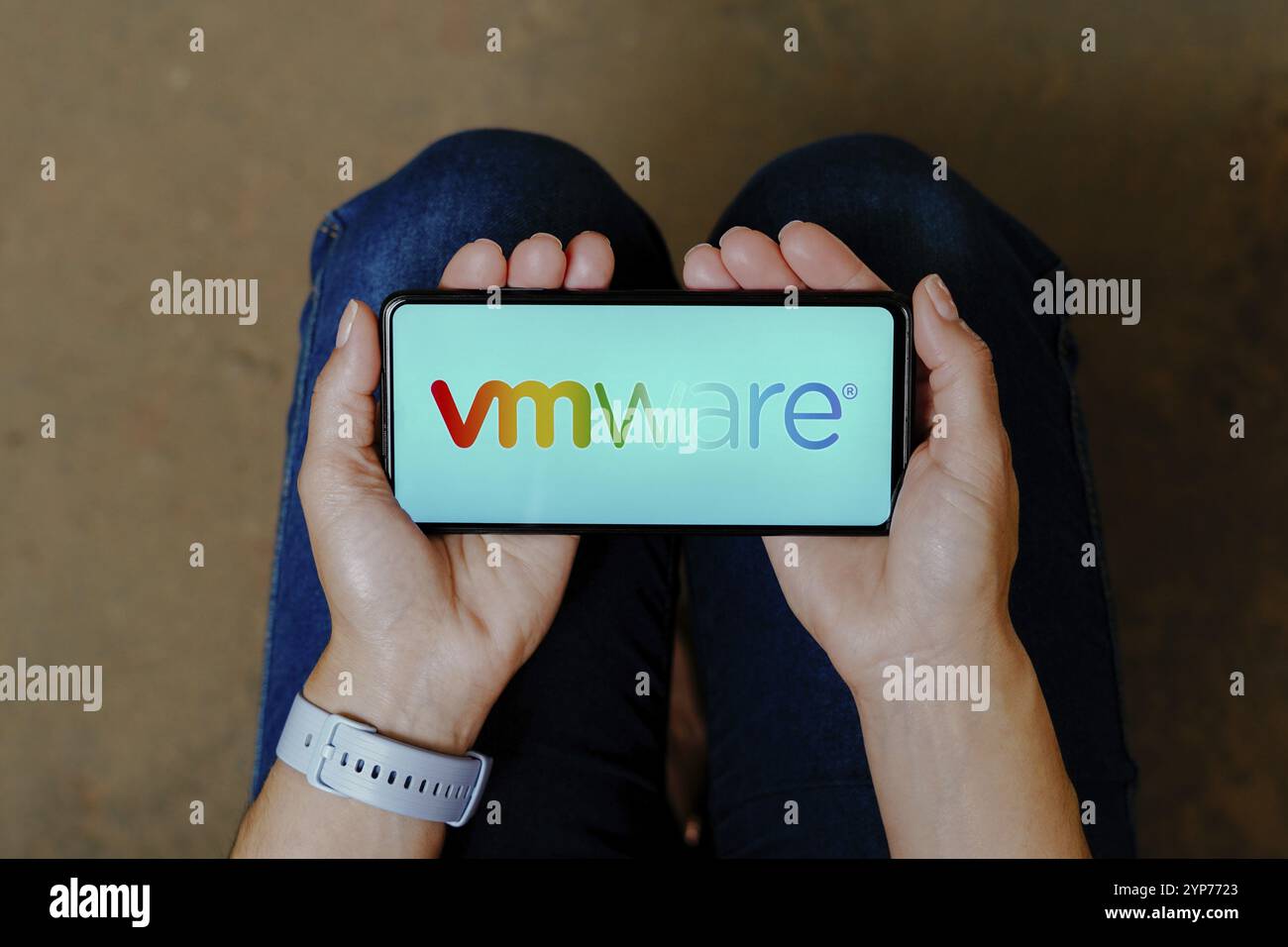 In this photo illustration, the VMware logo is displayed on a ...