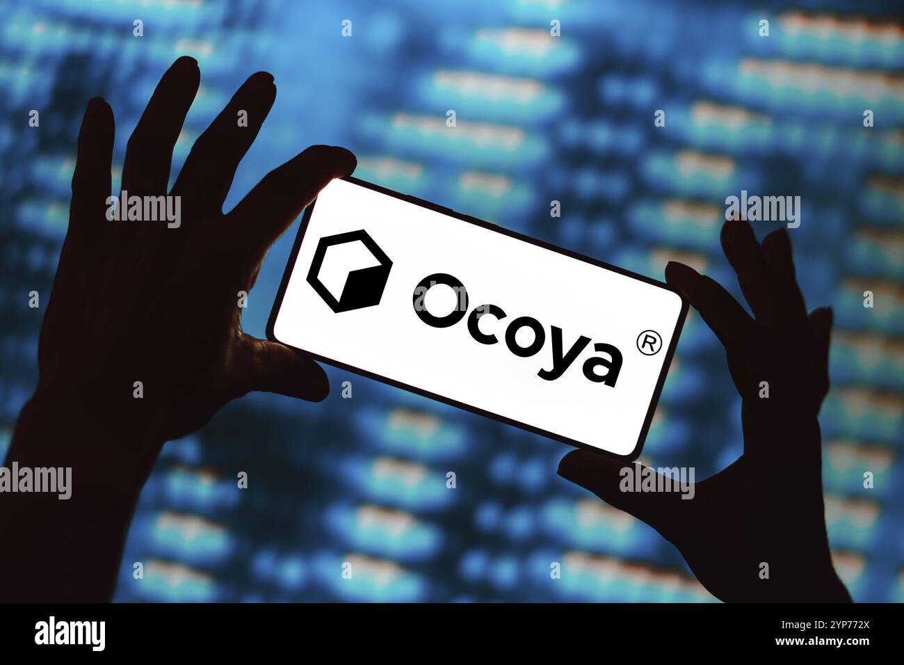In this photo illustration, the Ocoya AI logo is displayed on a smartphone screen Stock Photo ...