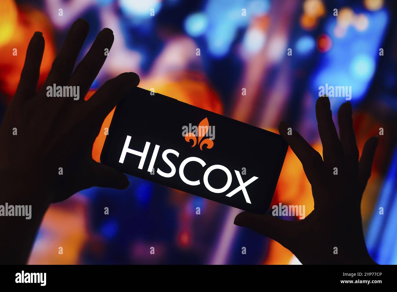 In this photo illustration, the Hiscox logo is displayed on a ...