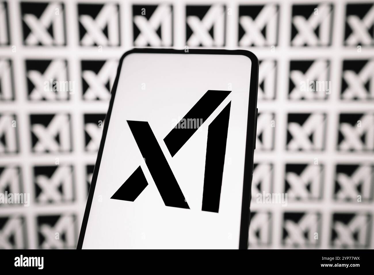 In this photo illustration, the xAI logo seen displayed on a smartphone ...