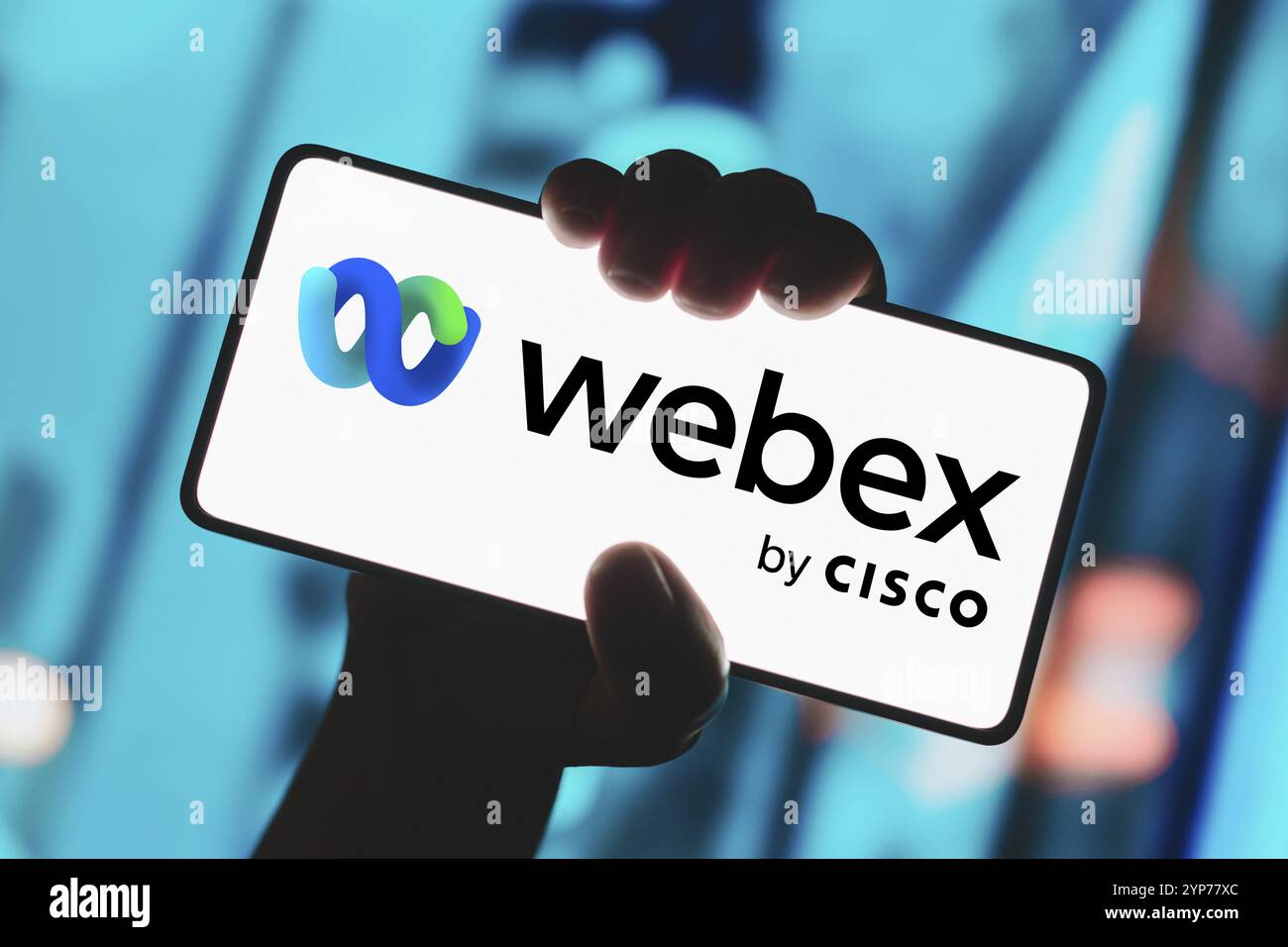 In this photo illustration, the Cisco Webex logo is displayed on a ...