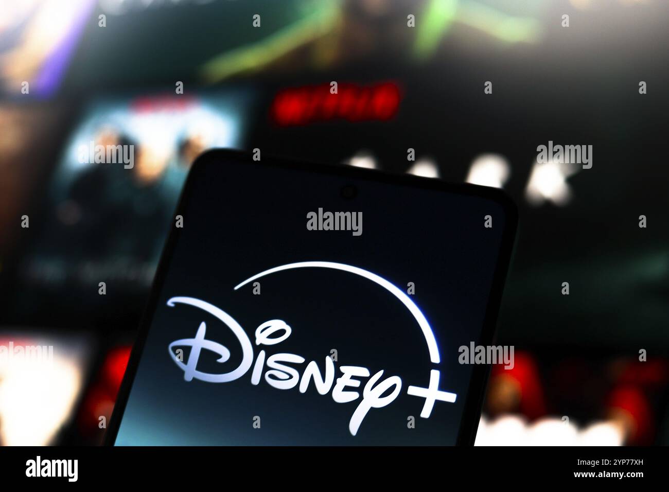 In this photo illustration, the Disney Plus logo is displayed on a ...