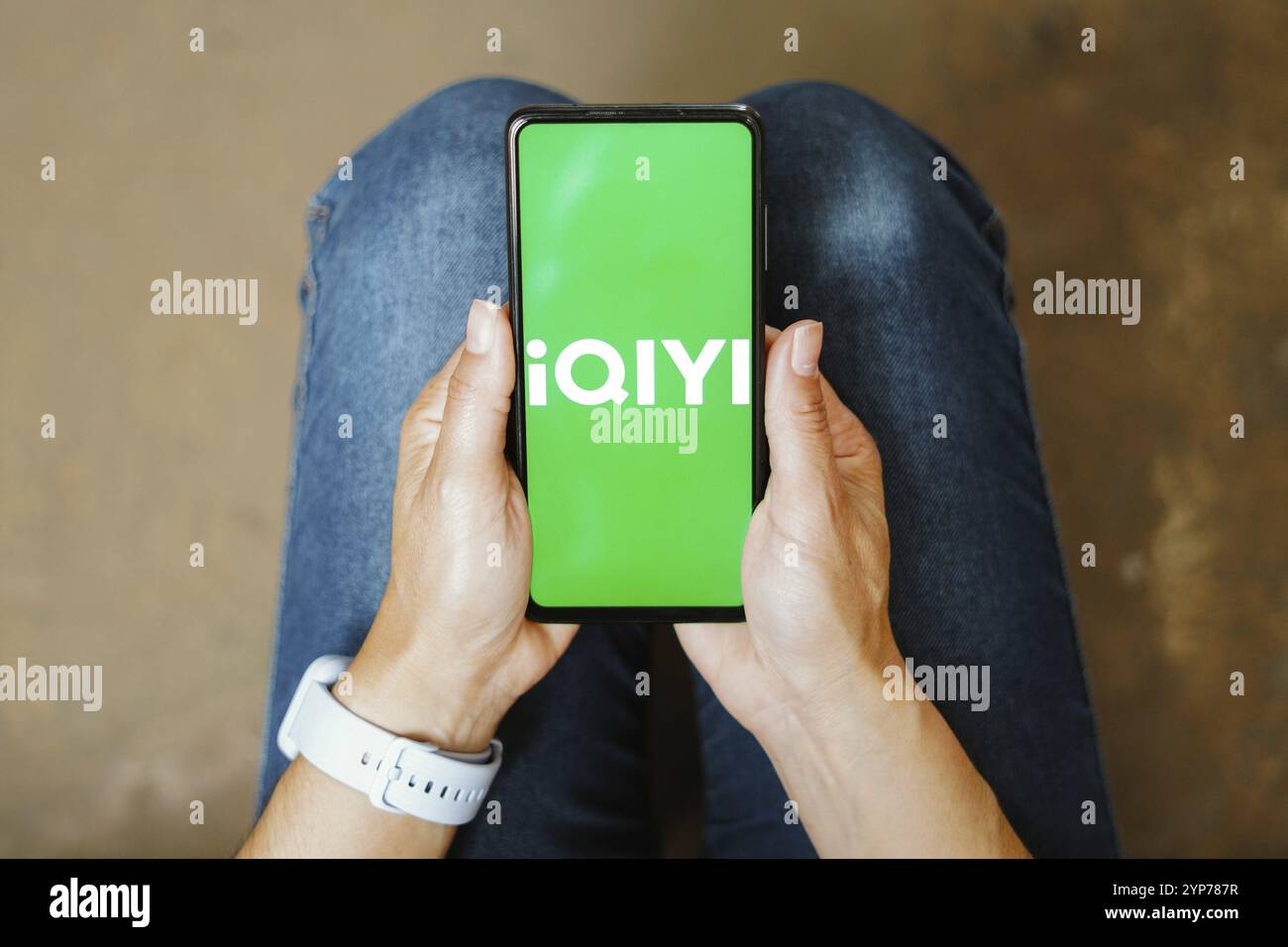In this photo illustration, the IQIYI logo seen displayed on a ...