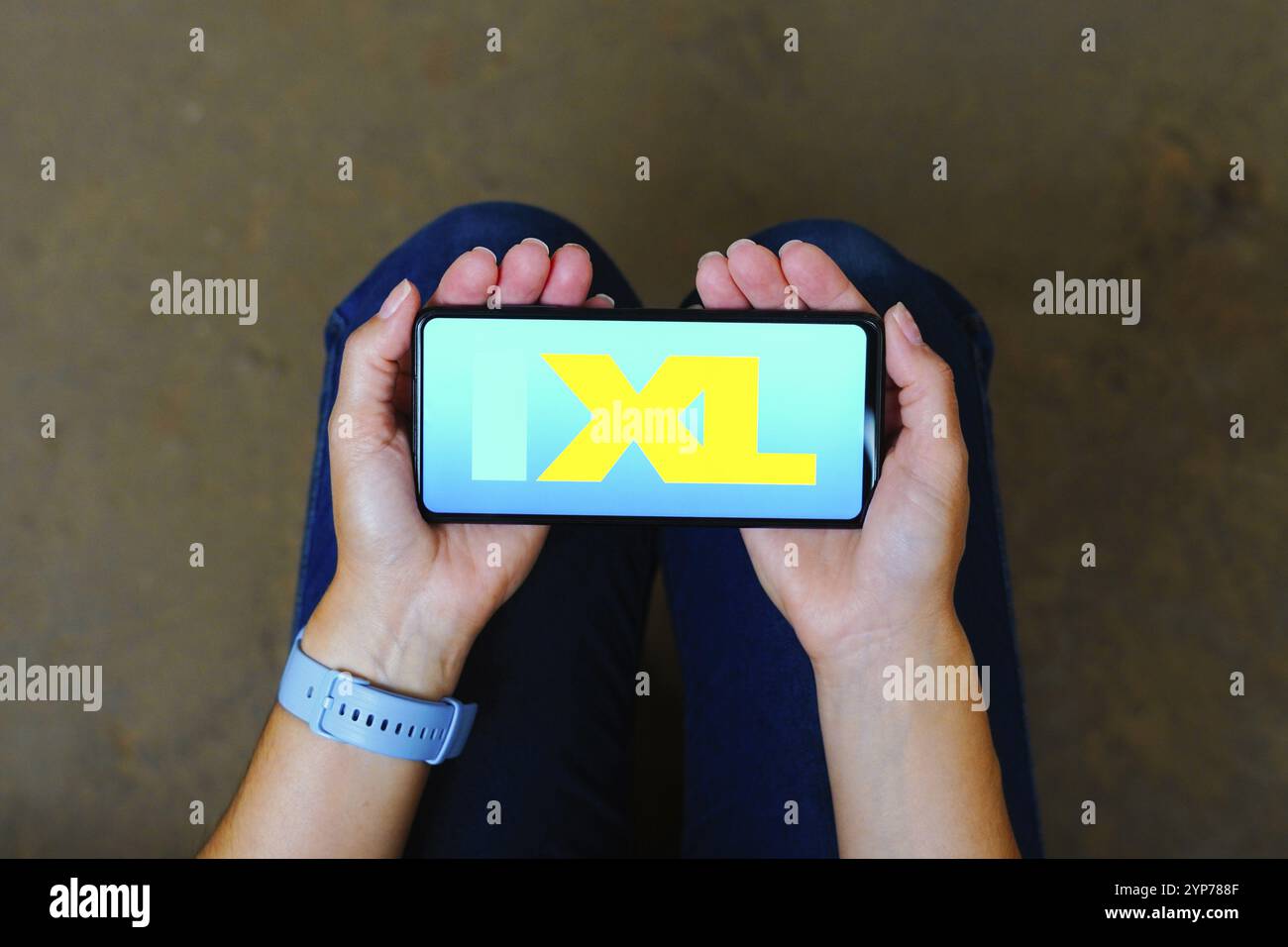 In this photo illustration, the IXL Learning logo seen displayed on a ...