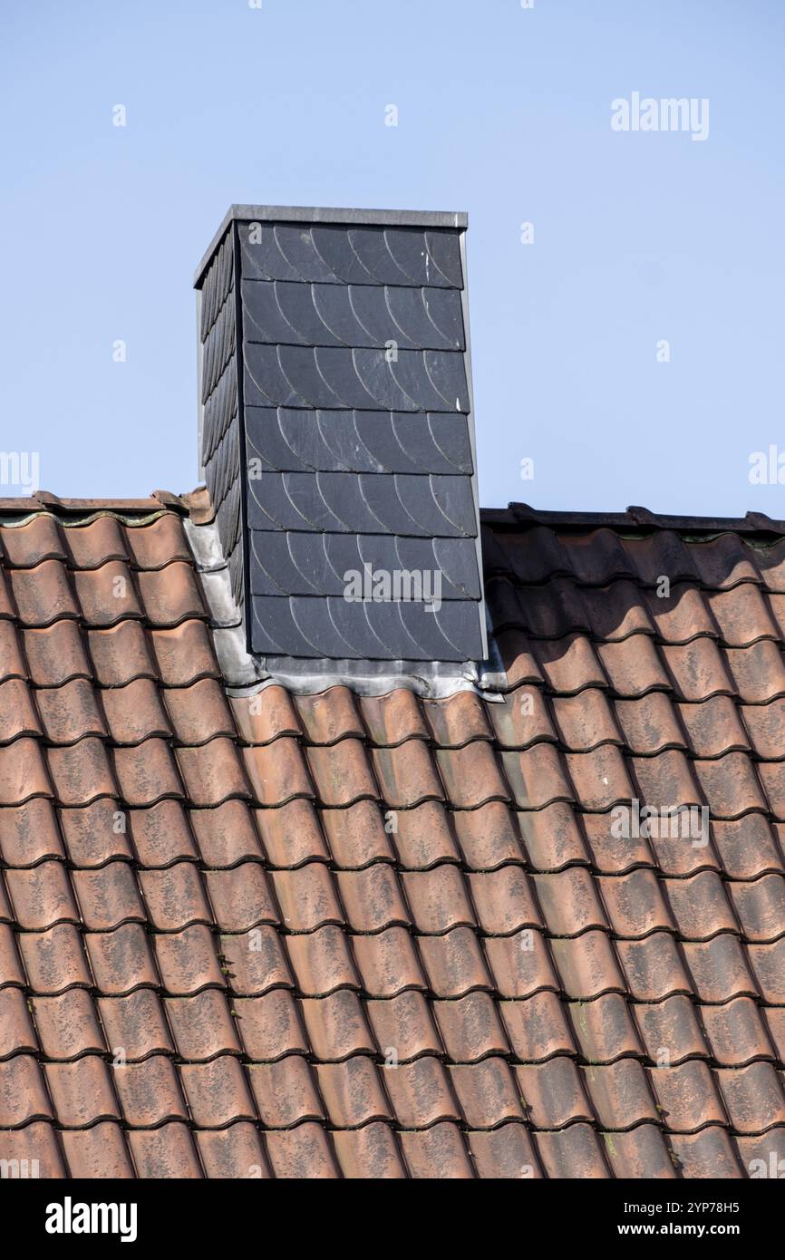 Chimney on a clay tile roof Stock Photo - Alamy