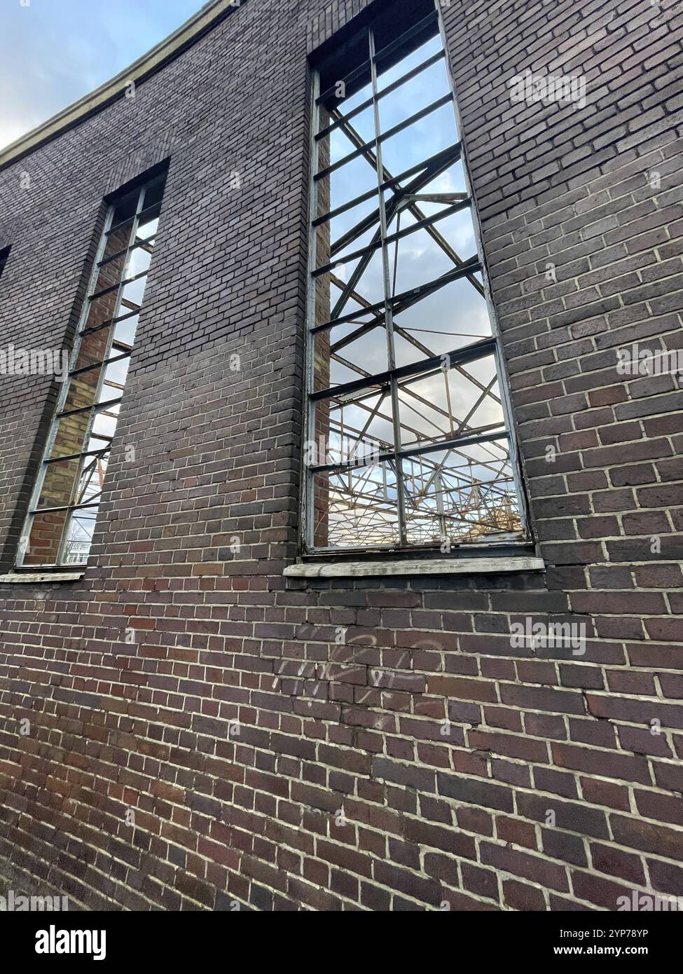 Old industrial building, brick and steel Stock Photo - Alamy