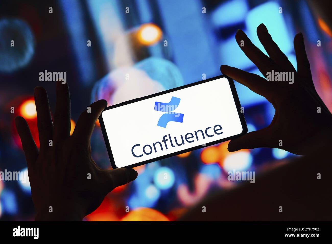 In this photo illustration, the Confluence logo seen displayed on a ...