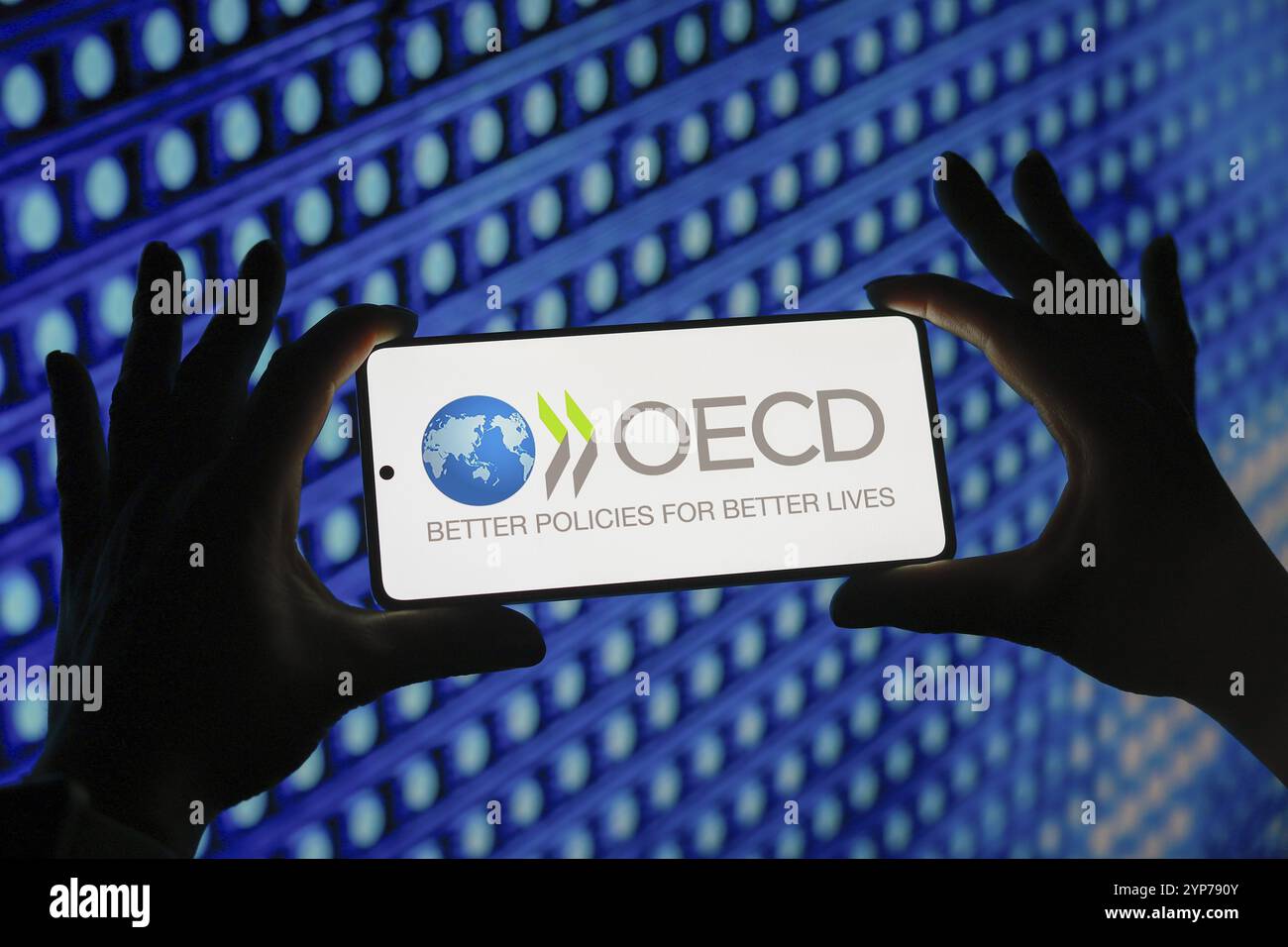 In this photo illustration, the Organisation for Economic Co-operation and Development (OECD ...