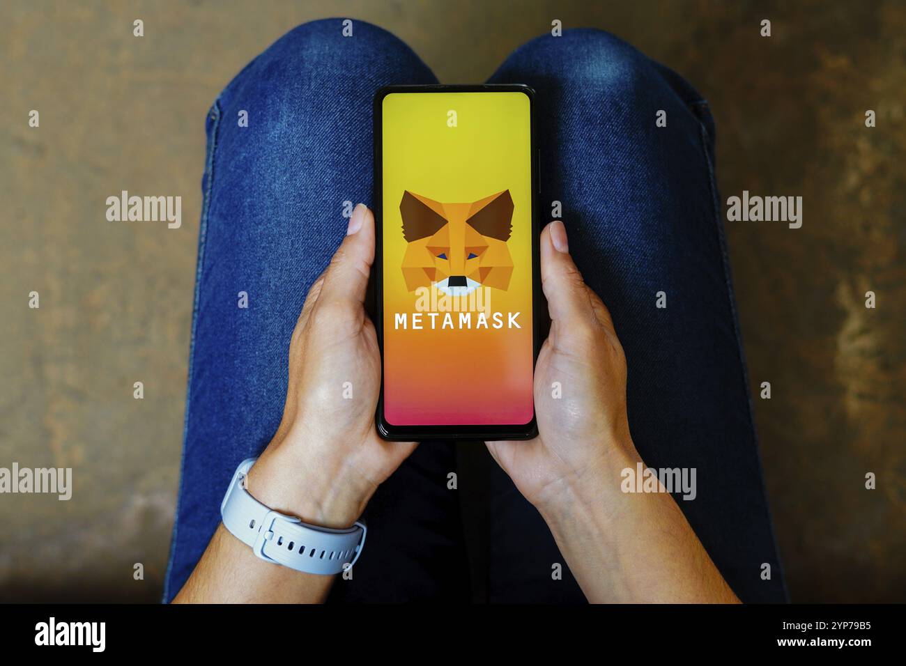 In this photo illustration, the MetaMask logo is displayed on a ...