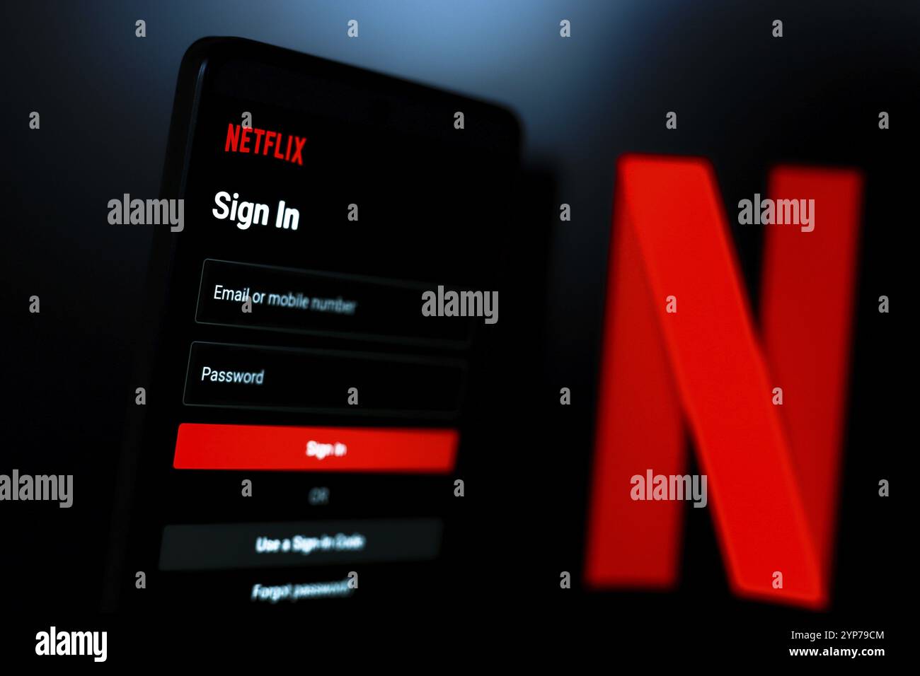 In this photo illustration, the Netflix login page is displayed on a ...