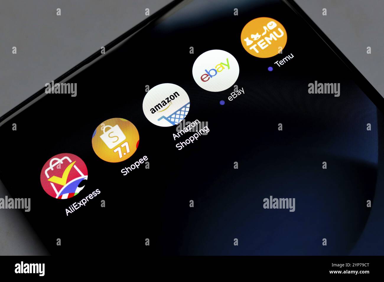 In this photo illustration, the app logo AliExpress, Shopee, Amazon ...