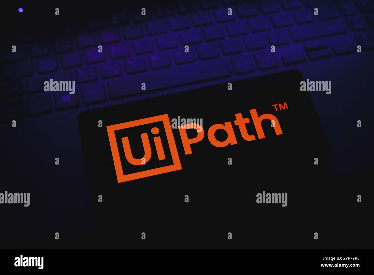 In this photo illustration, the UiPath logo is displayed on a ...