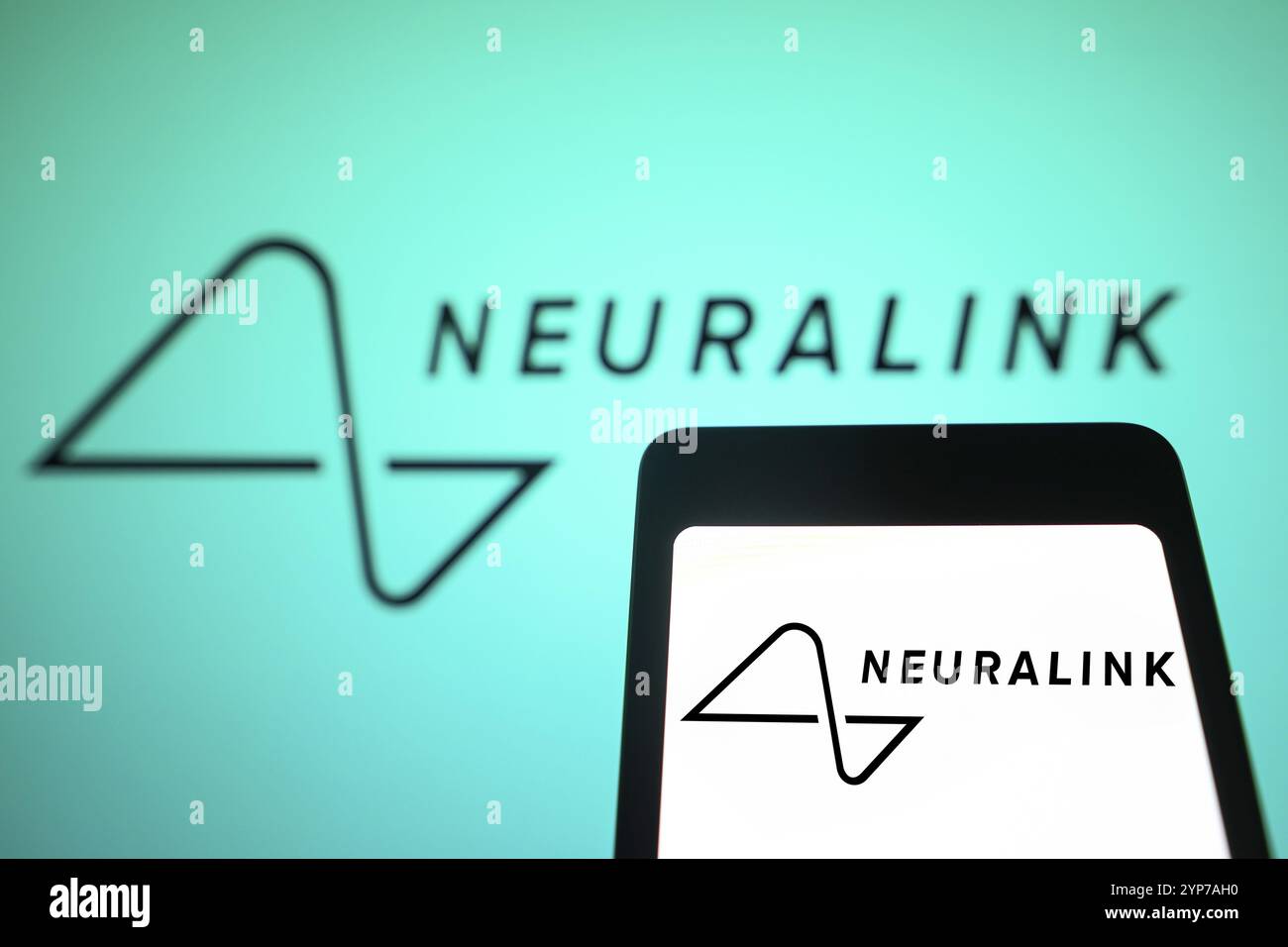 In this photo illustration, the Neuralink logo is displayed on a ...