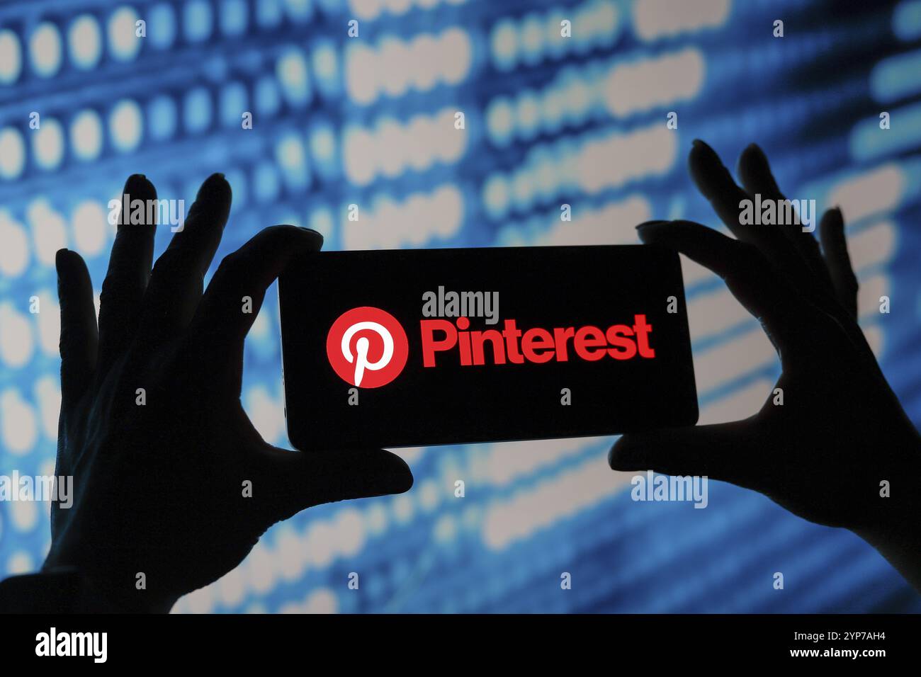 In this photo illustration, the Pinterest logo is displayed on a ...