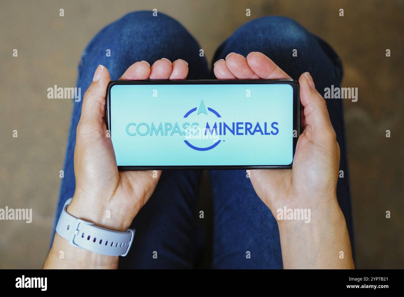In this photo illustration, the Compass Minerals International logo is ...