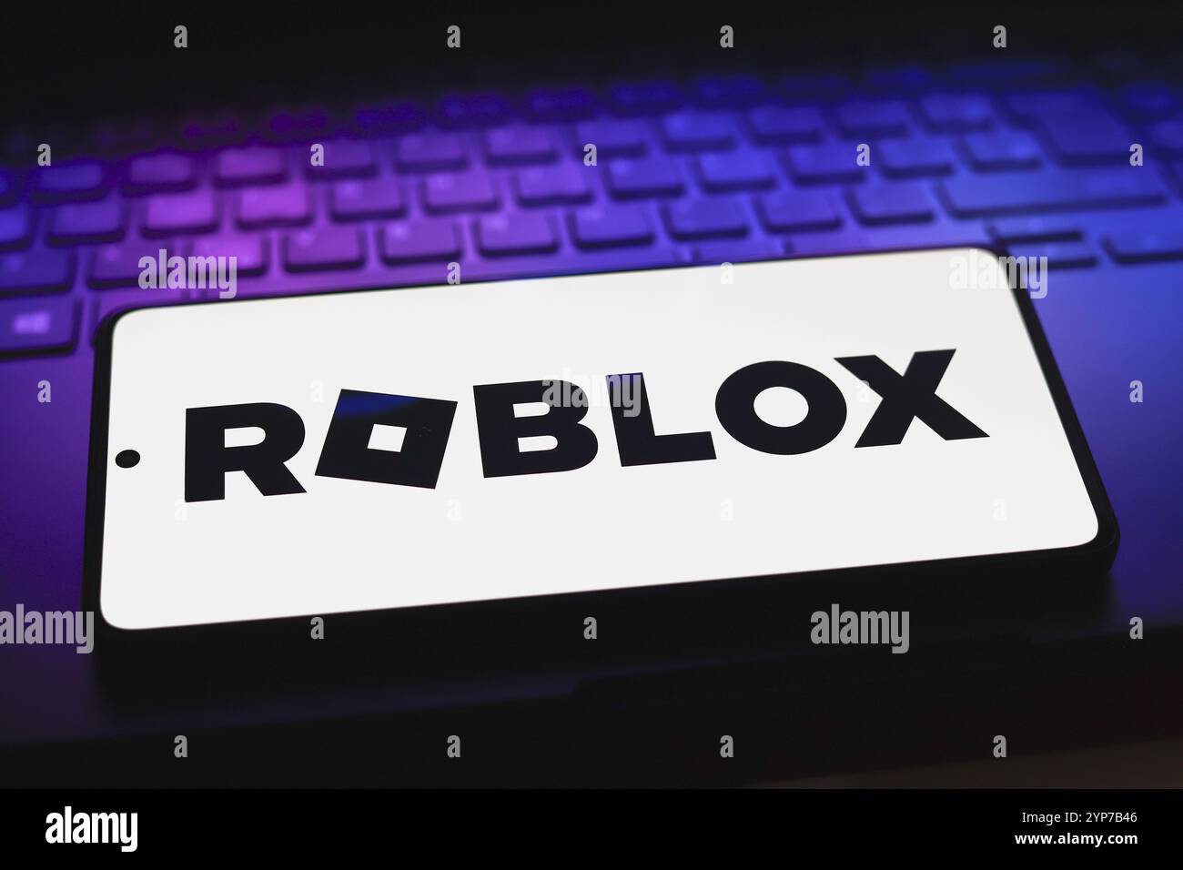 In this photo illustration, the Roblox logo is displayed on a ...