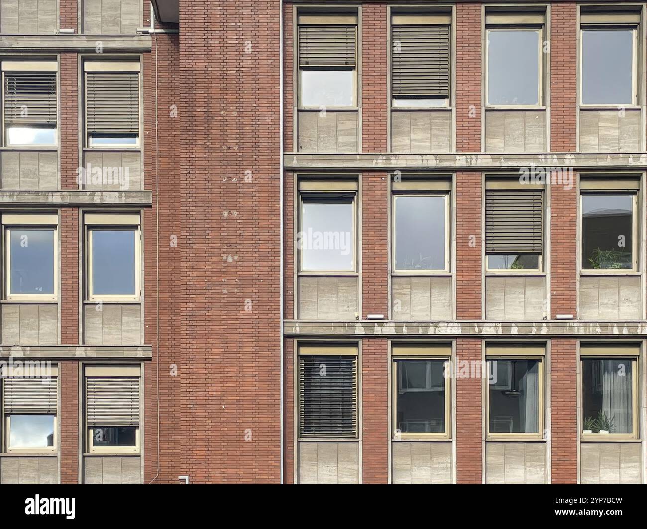 Residential building with rows of windows from the 60s Stock Photo - Alamy