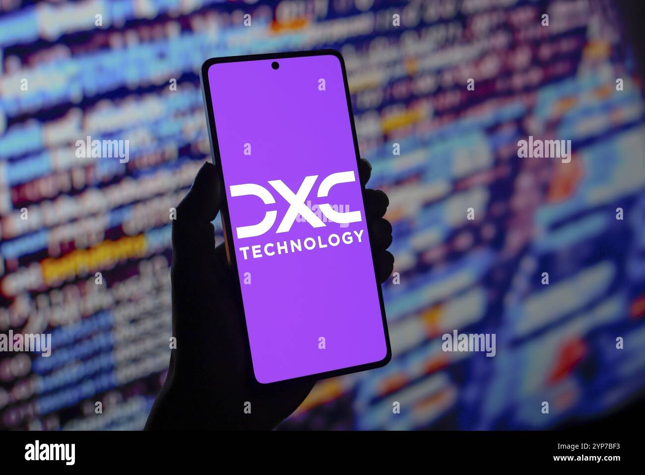 In this photo illustration, the DXC Technology Company logo is displayed on a smartphone screen ...