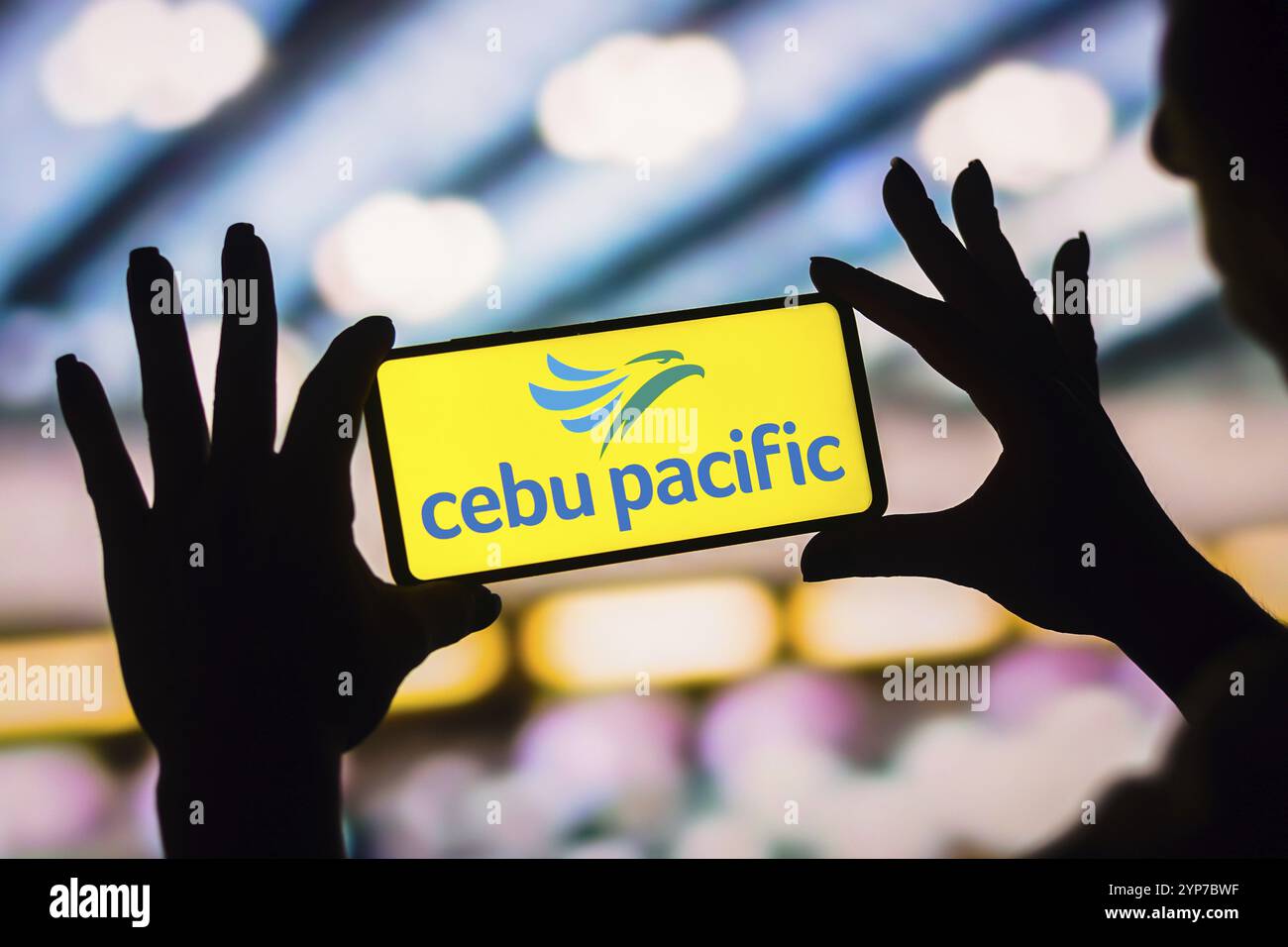 In this photo illustration, the Cebu Pacific Air logo is displayed on a ...