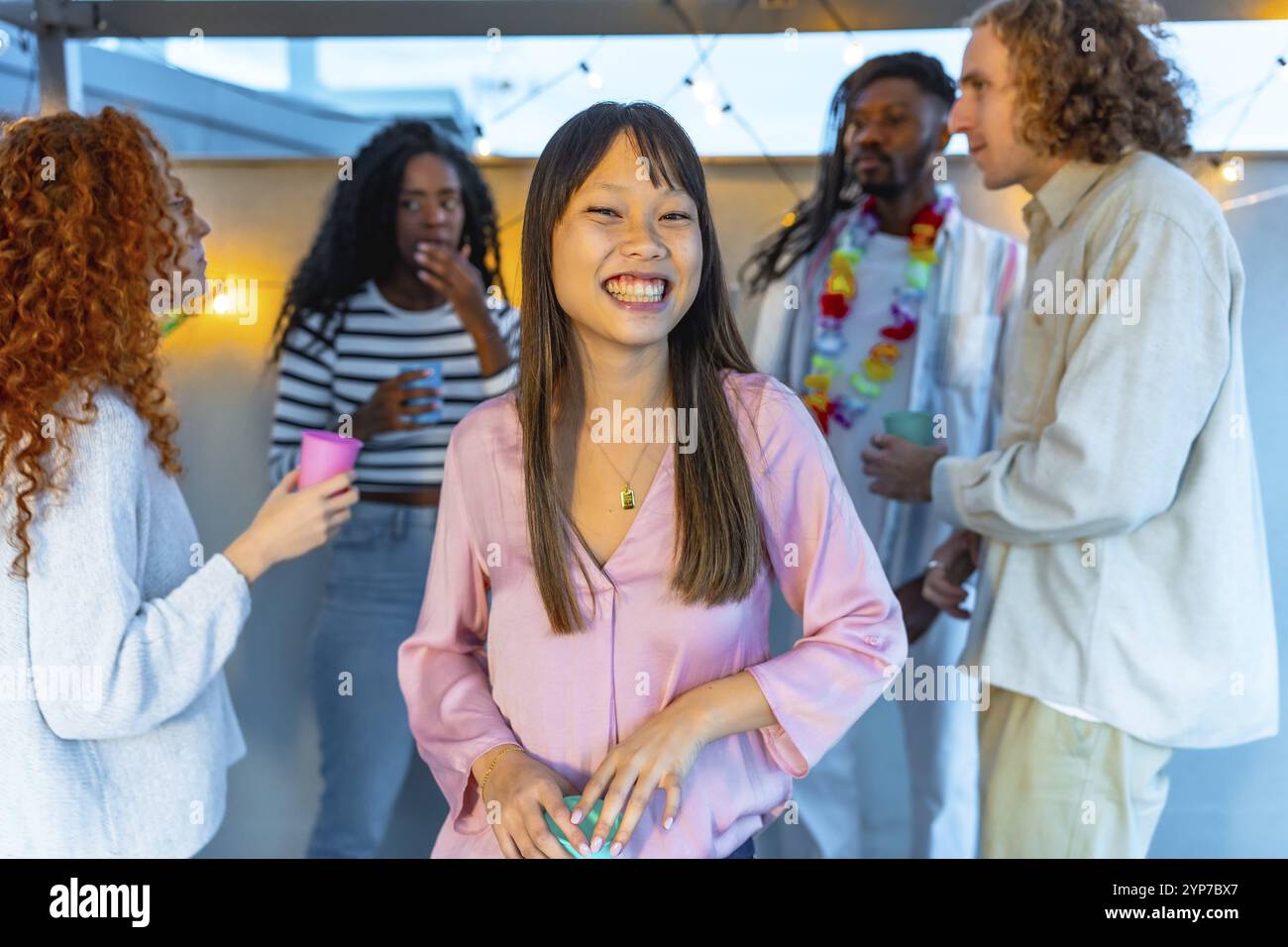 Group happy friends stands hi-res stock photography and images - Alamy