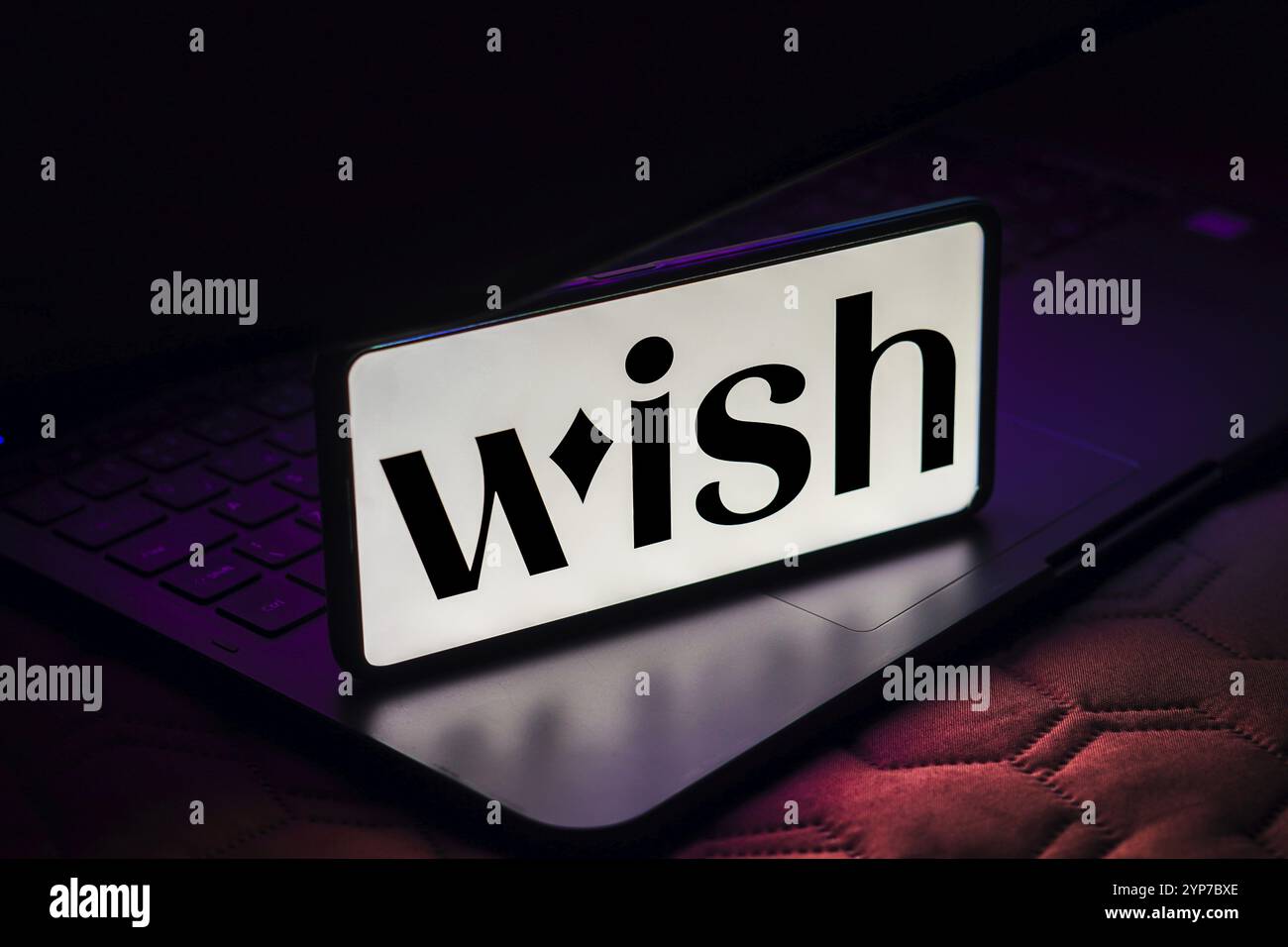 In this photo illustration, the Wish logo is displayed on a smartphone ...