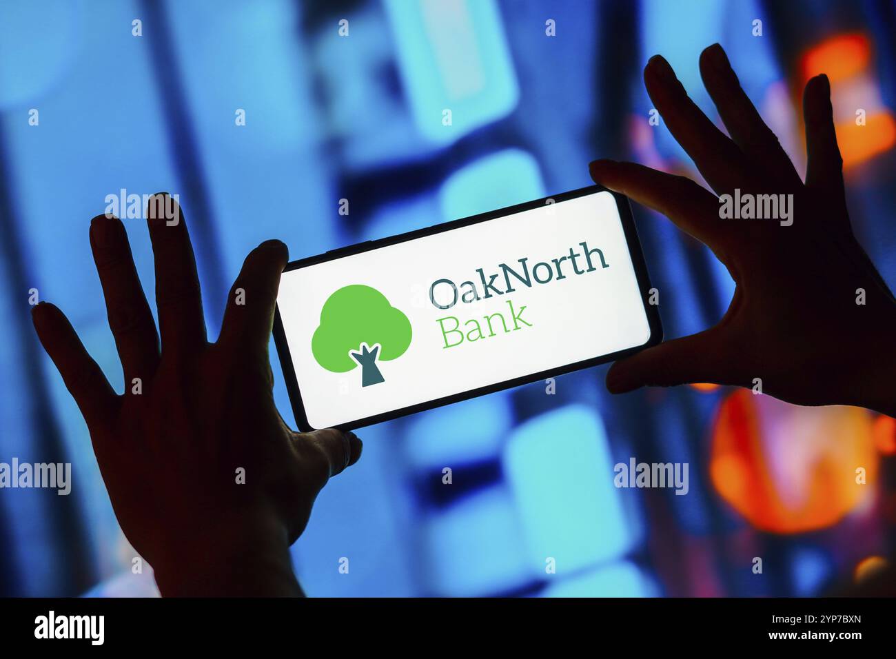 In this photo illustration, the OakNorth Bank logo is displayed on a smartphone screen Stock ...