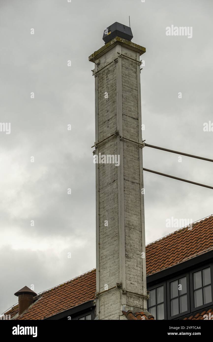 Free-standing chimneys on an old house Stock Photo - Alamy