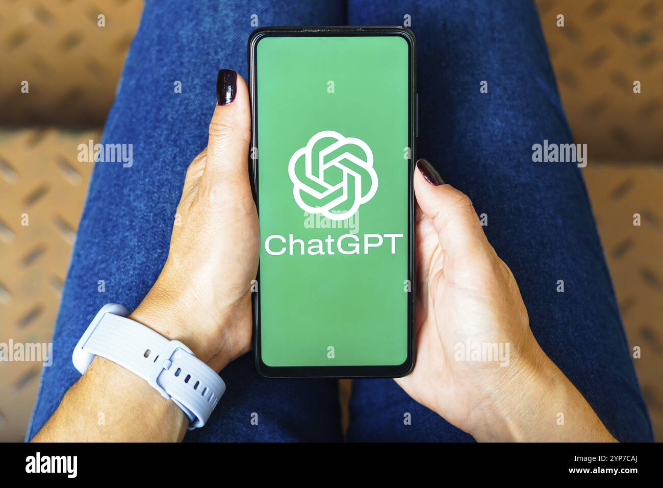 In this photo illustration, the ChatGPT logo is displayed on a ...