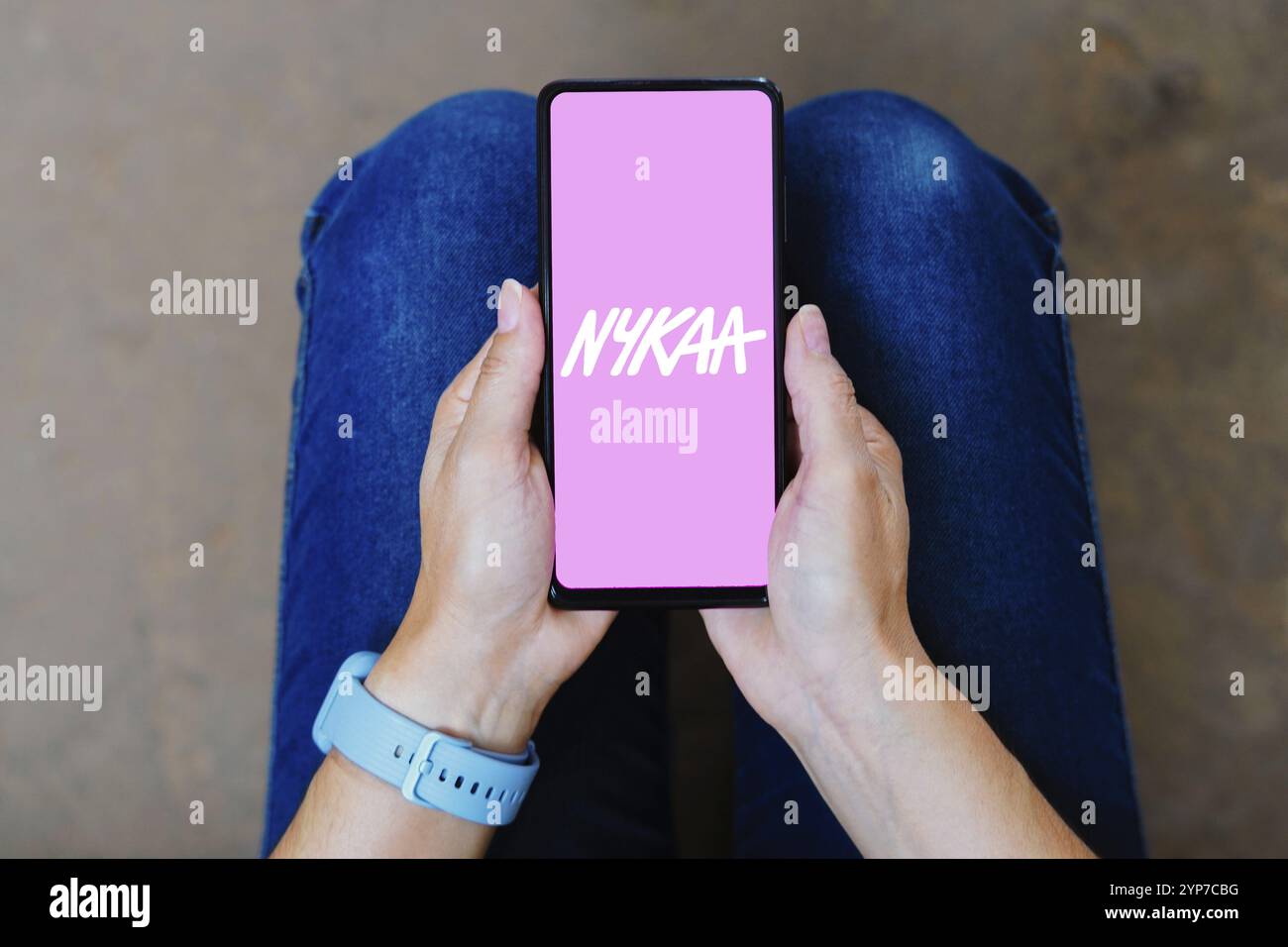 In this photo illustration, the Nykaa logo seen displayed on a ...