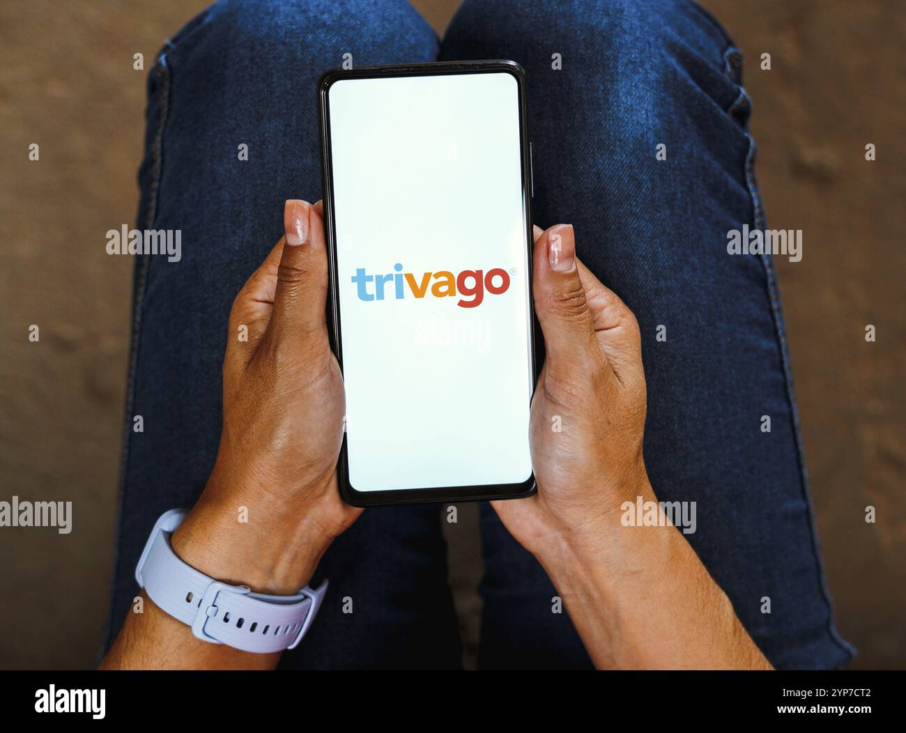 In this photo illustration, the Trivago logo is displayed on a ...