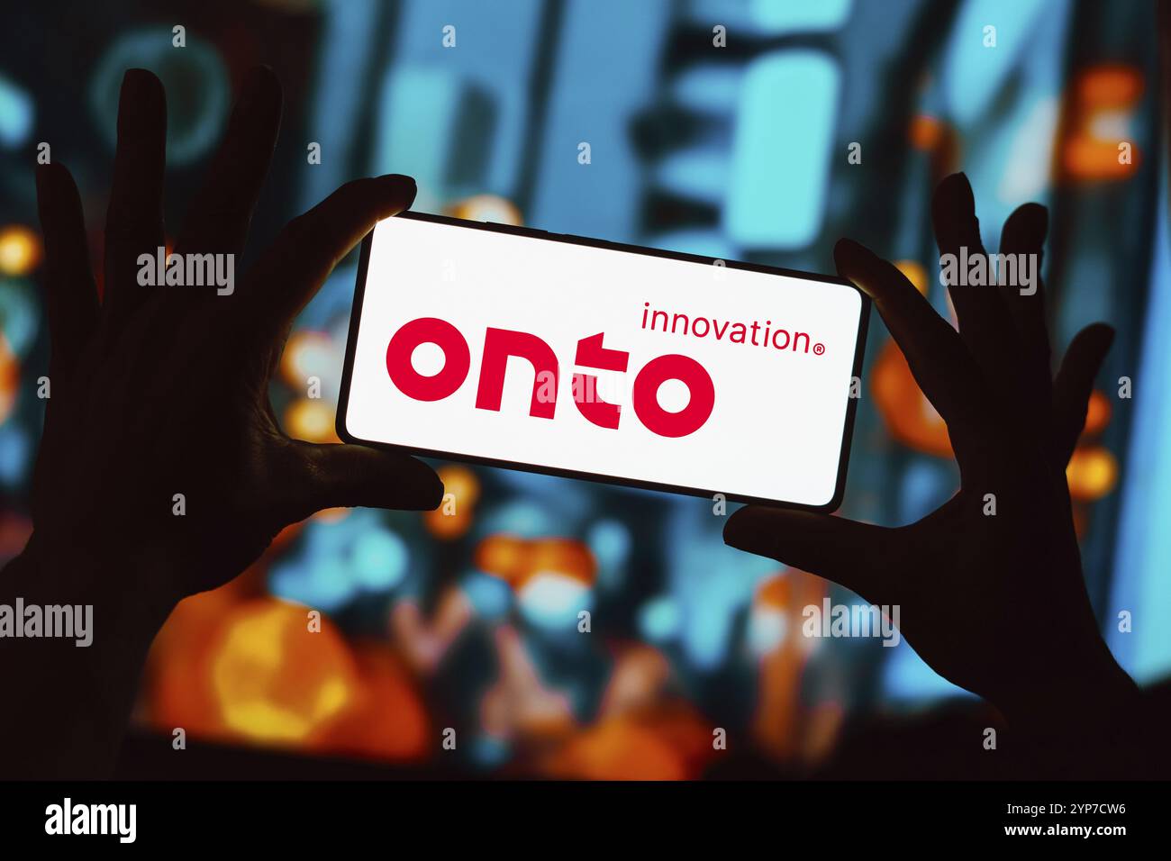 In this photo illustration, the Onto Innovation logo is displayed on a ...