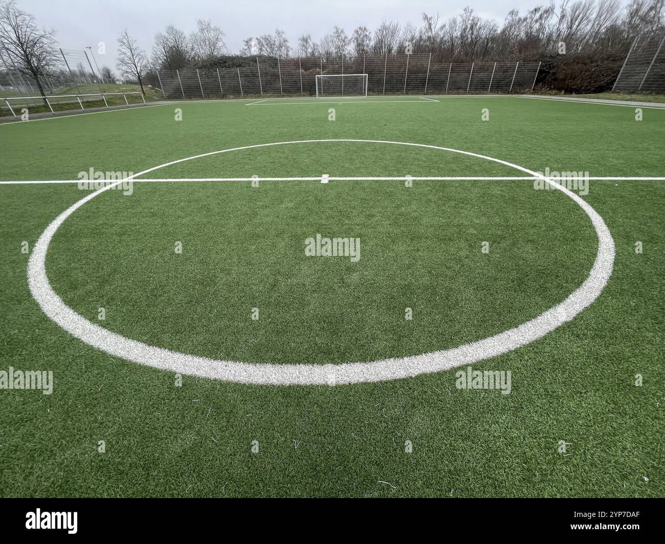 Kick-off circle on sports field Stock Photo - Alamy