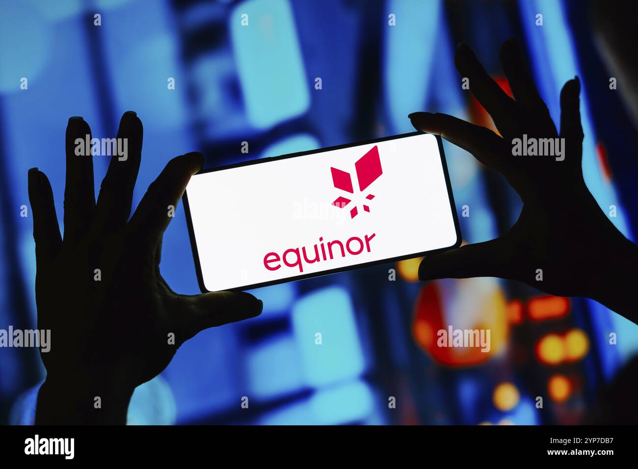 In this photo illustration, the Equinor logo is displayed on a ...