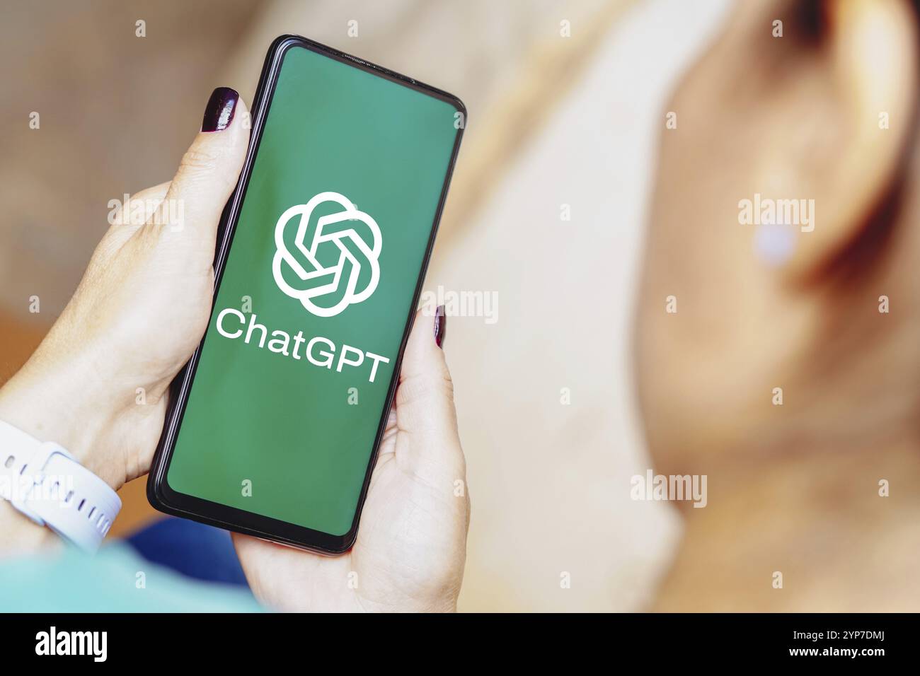 In this photo illustration, the ChatGPT logo is displayed on a ...